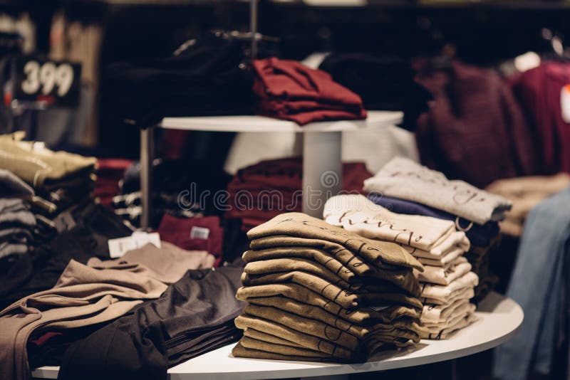 Stack of Men Clothes in Men`s Clothing Store Stock Photo - Image of ...