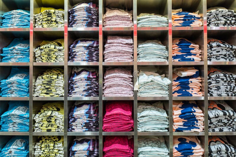 Clothes in a store stock photo. Image of heap, cloth - 64238224
