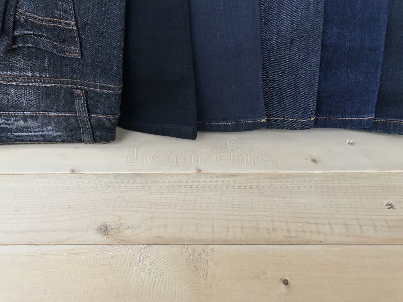 Dark Blue Jeans on Wooden Floor Stock Photo - Image of pants, denim ...