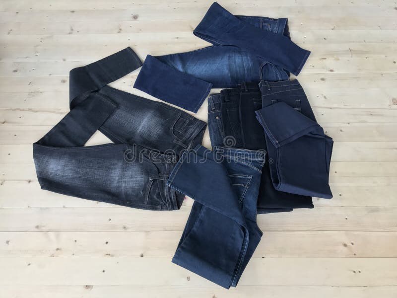 Dark Blue Jeans on Wooden Floor Stock Photo - Image of fashion, texture ...