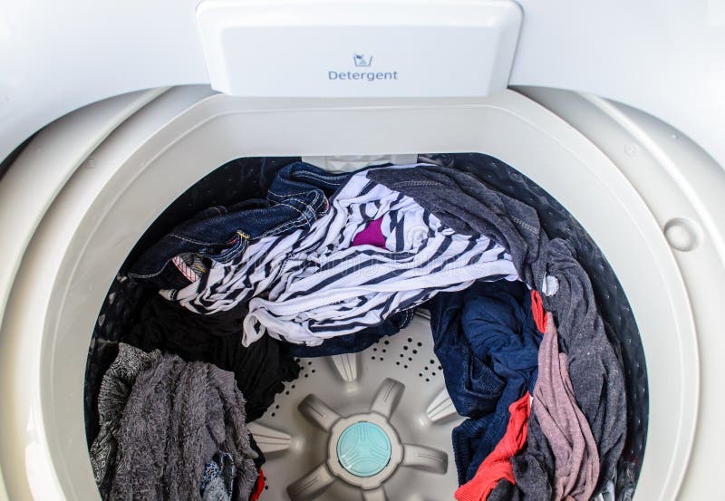 Clothes in Washing Machine stock photo. Image of tumble - 70169262