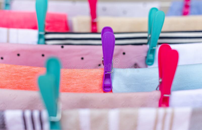 Clothespin on a Laundry Line Outside with Bright Blue Sky Stock Photo ...