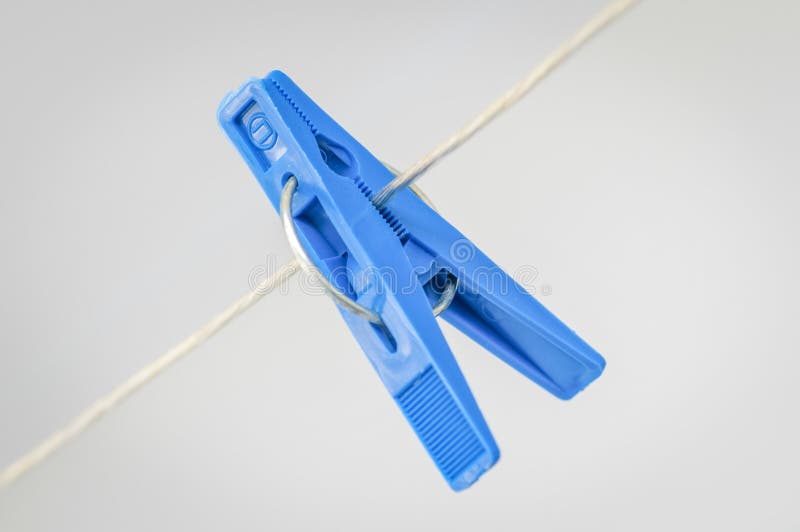 Clothespin Hanging on a Clothesline Stock Photo - Image of rope, blue ...