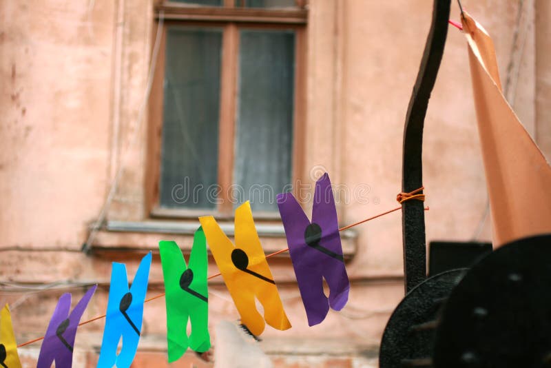 Clothespins from Paper Hanging on a Rope. Stock Image - Image of ...