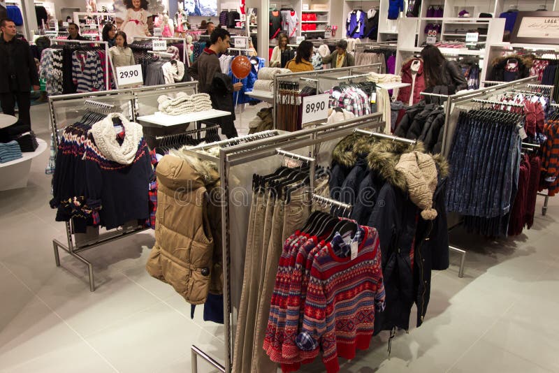 Clothing on Hangers in Store Editorial Photo - Image of lane, hangers ...