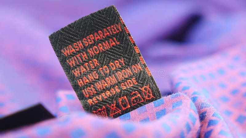 Clothing Label with Care Symbols on a Cloth Stock Video - Video of shop ...