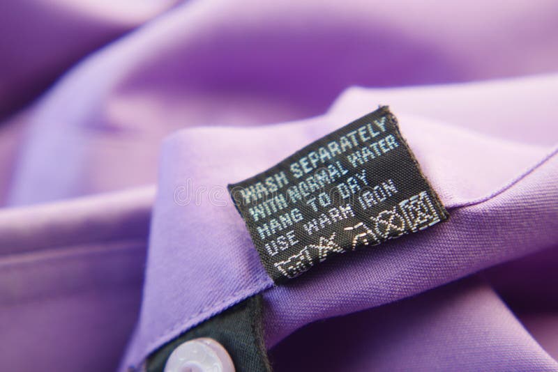Clothing Label with Care Symbols on a Cloth Stock Photo - Image of ...