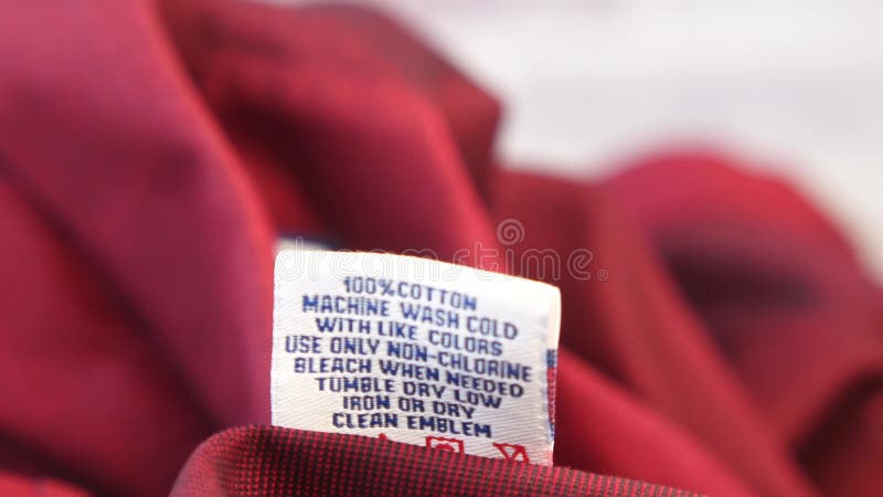 Clothing Label with Care Symbols on a Cloth Stock Footage - Video of ...