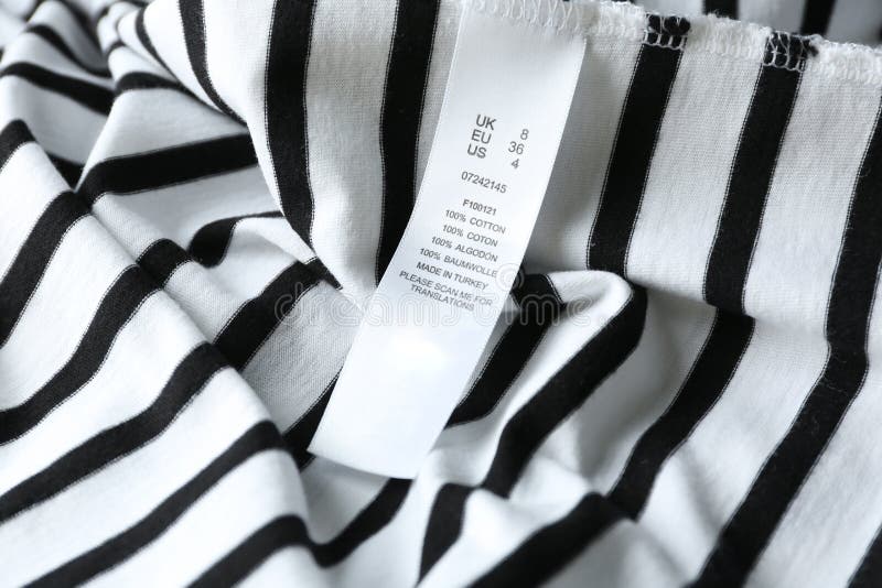 Clothing Label with Size and Content Information on Striped Garment ...