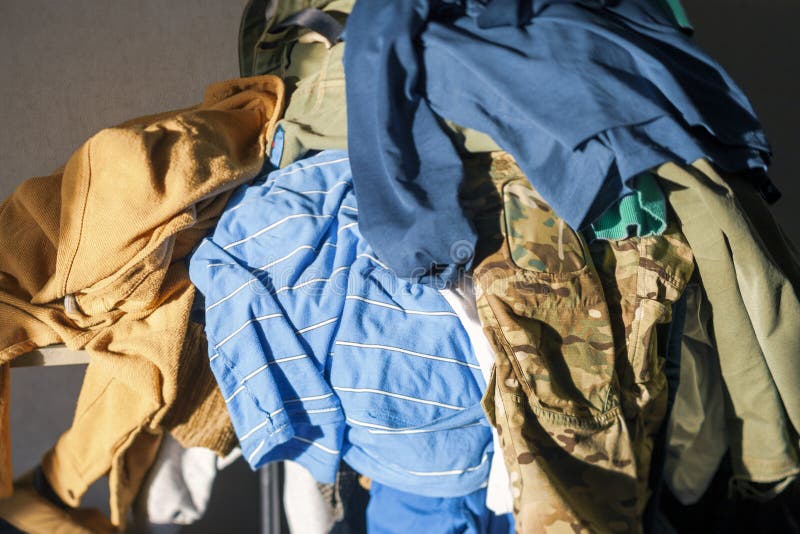 Clothing in mess stock photo. Image of assorted, pile - 263401102