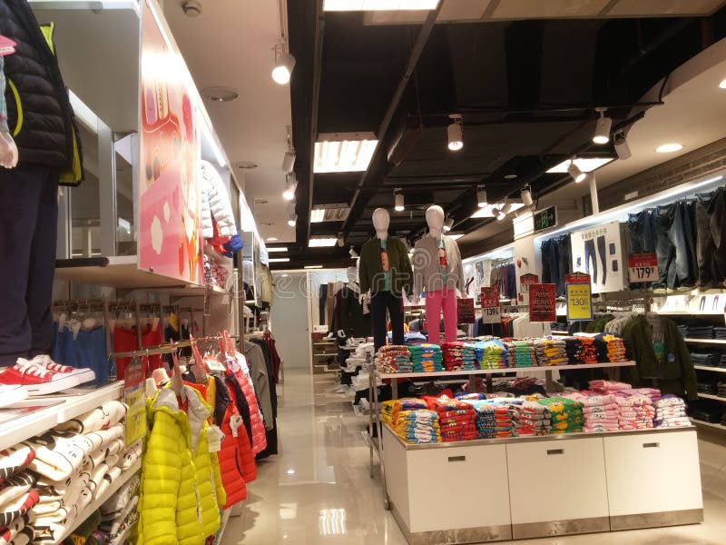 Clothing and Clothing Models on Display in the Clothing Store Editorial ...