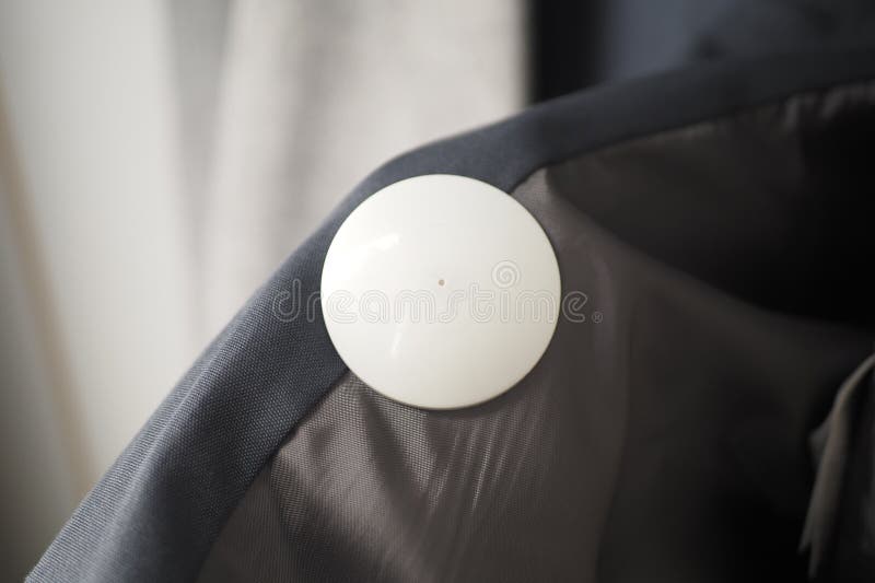 Clothing Security Tag on a Shirt , Stock Image - Image of interior ...