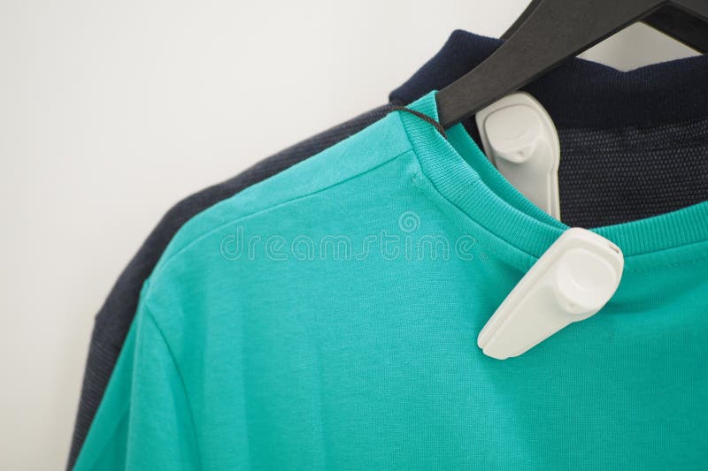 Clothing Security Tag on a Shirt , Stock Image - Image of security ...