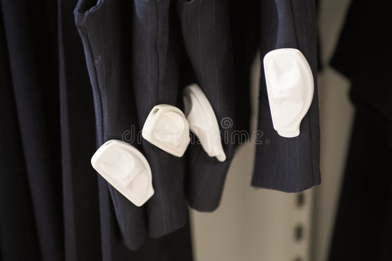 Clothing Security Tag on a Shirt , Stock Photo - Image of commercial ...