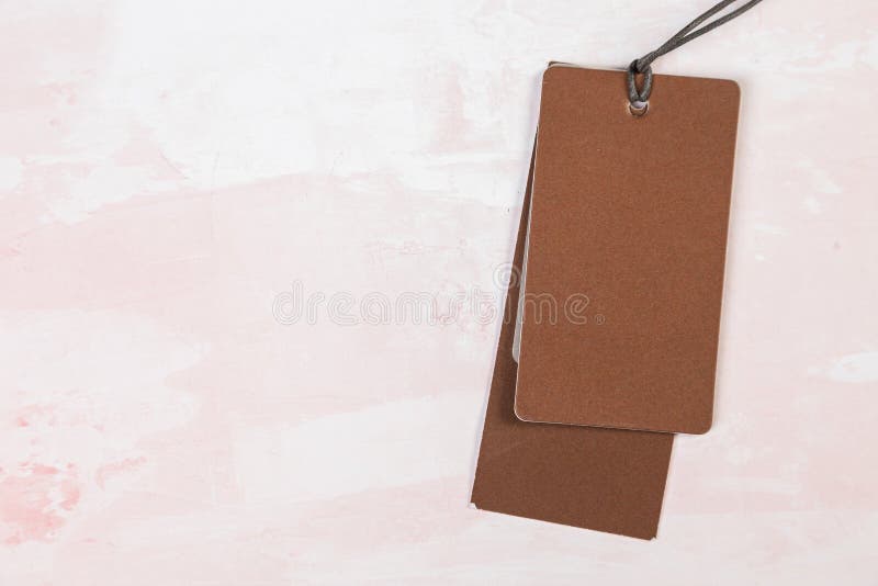 Clothing Tag, Label Blank Mockup Template on a Marble Pink Table Stock ...