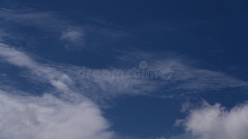 Cloud and Blue Sky Time-lapse of Dramatic Fast Moving White Clouds on Sunny Blue Sky Stock Video ...