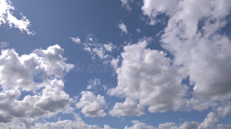 Cloud and Blue Sky Time-lapse of Dramatic Fast Moving White Clouds on Sunny Blue Sky Stock Video ...