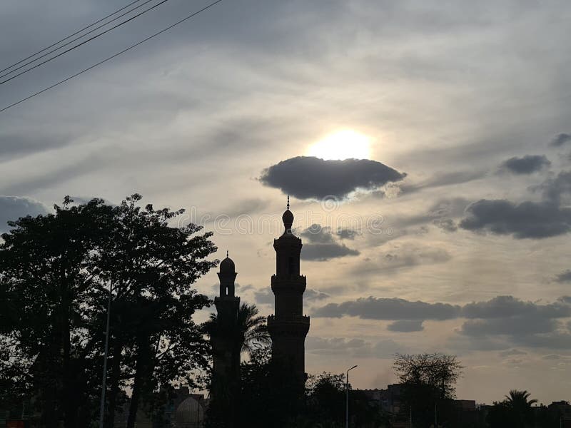 A cloud carry the Sun stock photo. Image of trees, mosque - 260260350