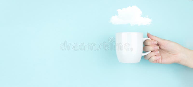 Cloud Computing Concept. Girl Hand Hold Morning Coffee Cup with Abstract Cloud Sign Icon on Blue ...
