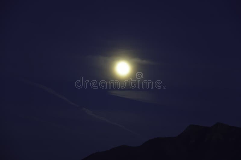 Cloud covered full moon stock photo. Image of blur, blury - 65792556