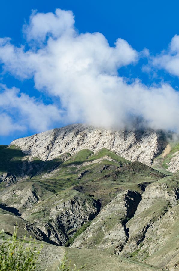 Cloud Covering the Mountain. Mountain Peak Covered by Clouds and Fog ...