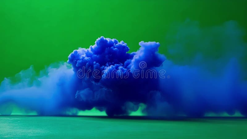 A Cloud of Deep Blue Powder Billows Dramatically Contrasting with the ...