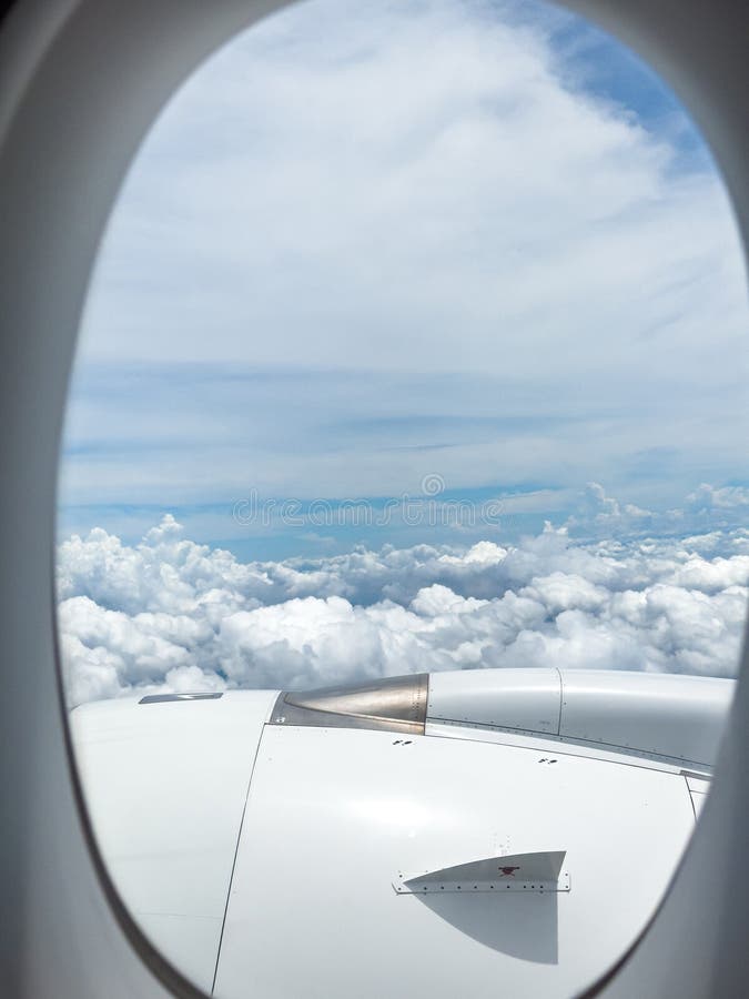 Cloud Formations Viewed from an Airplane Window during Daytime Flight ...