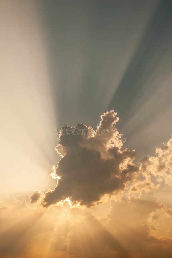 Cloud in Front of the Sun Showing Rays of Light Stock Image - Image of ...