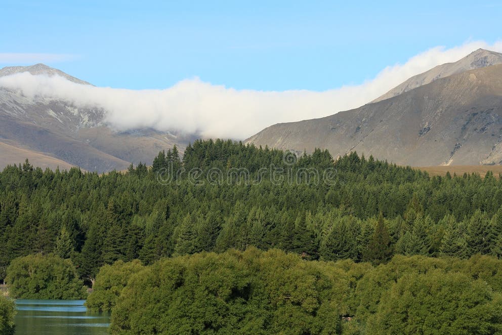Cloud Inversion at Lake Tekapo Stock Photo - Image of wilderness, green ...