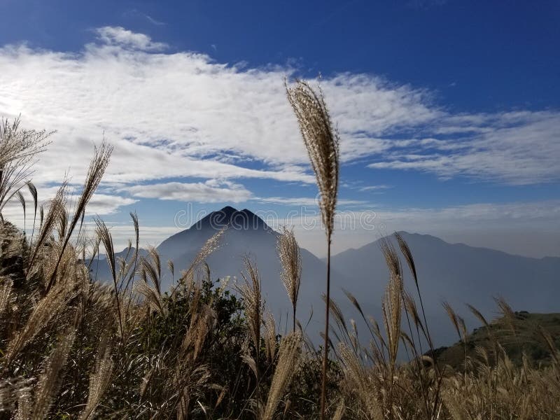 Cloud mountain grass stock photo. Image of cloud, blue - 188955334