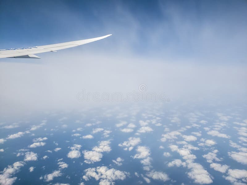Cloud Patterns with Airplane Flying between Layers Stock Image - Image ...