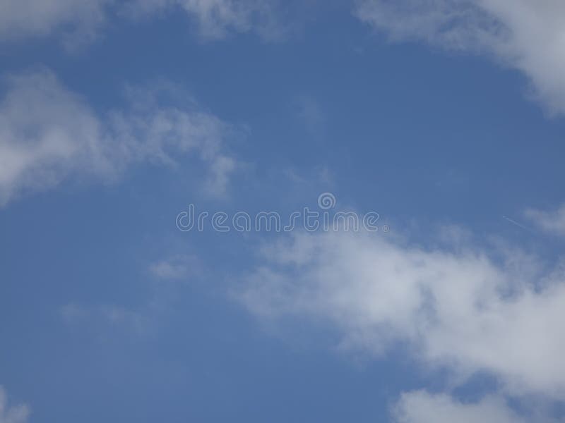 Light Fluffy White Clouds in Blue Sky Stock Photo - Image of wispy ...