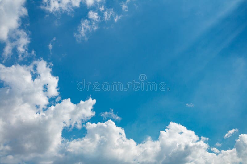 Cloud and rays on blue sky stock photo. Image of sunlight - 63535926