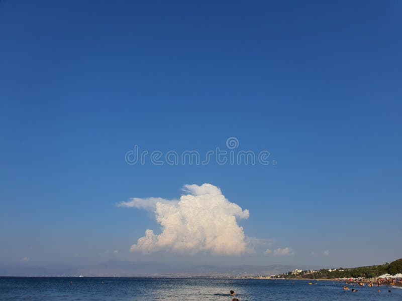 A Cloud Reflecting in the Blue Waters of Polis Chrysochous Bay in ...