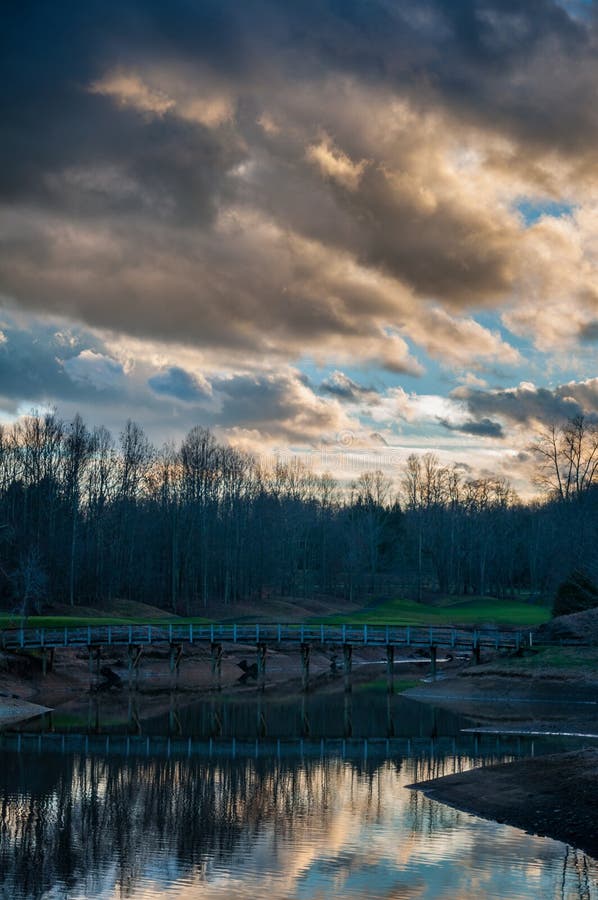 Cloud Reflection on Lake at Golf Course with Bridge Stock Photo - Image ...