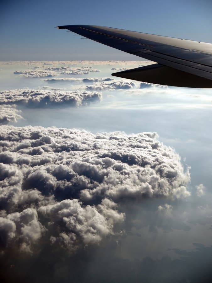 Cloud Trail Pattern with Airplane Wing Stock Photo - Image of airplane ...