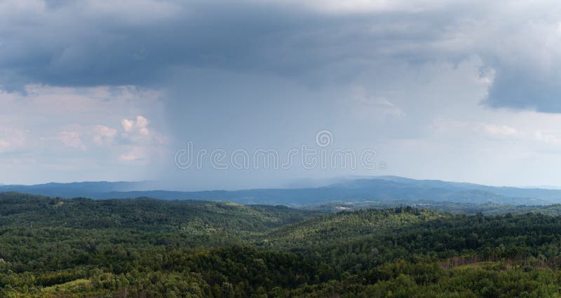 Cloudburst Above Hills Overgrown in Forests during Summer Stock Image ...