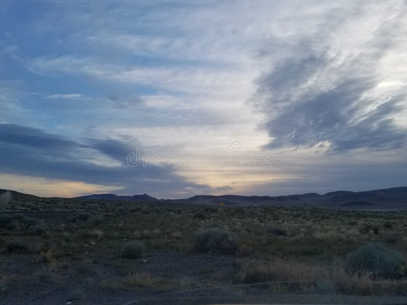Clouded Sunrise in Nevada stock image. Image of clouded - 74429351