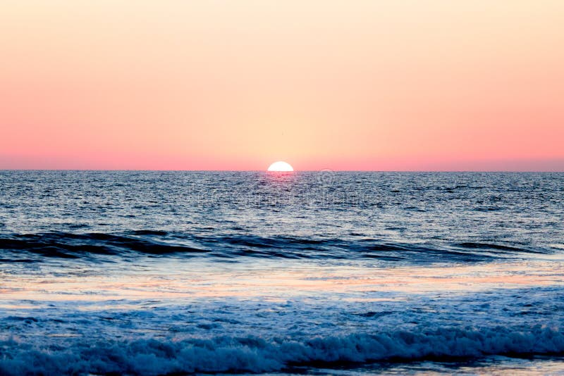 Cloudless Sunset stock photo. Image of seascape, blue - 74560518