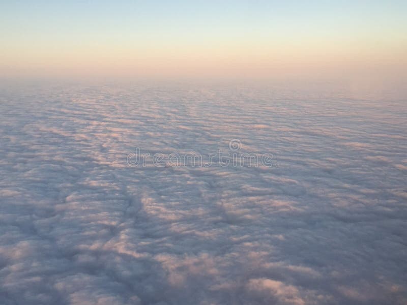 Clouds from above flat sky stock image. Image of quiet - 128828131