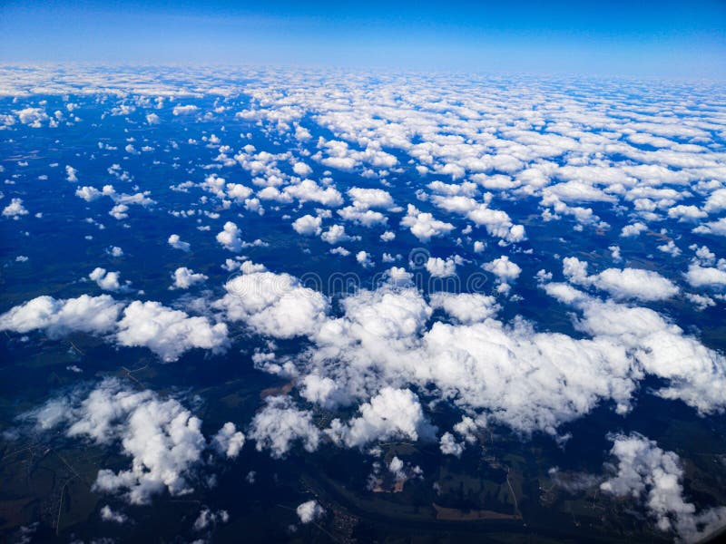 Clouds Above the Ground View from an Airplane As a Background Stock ...