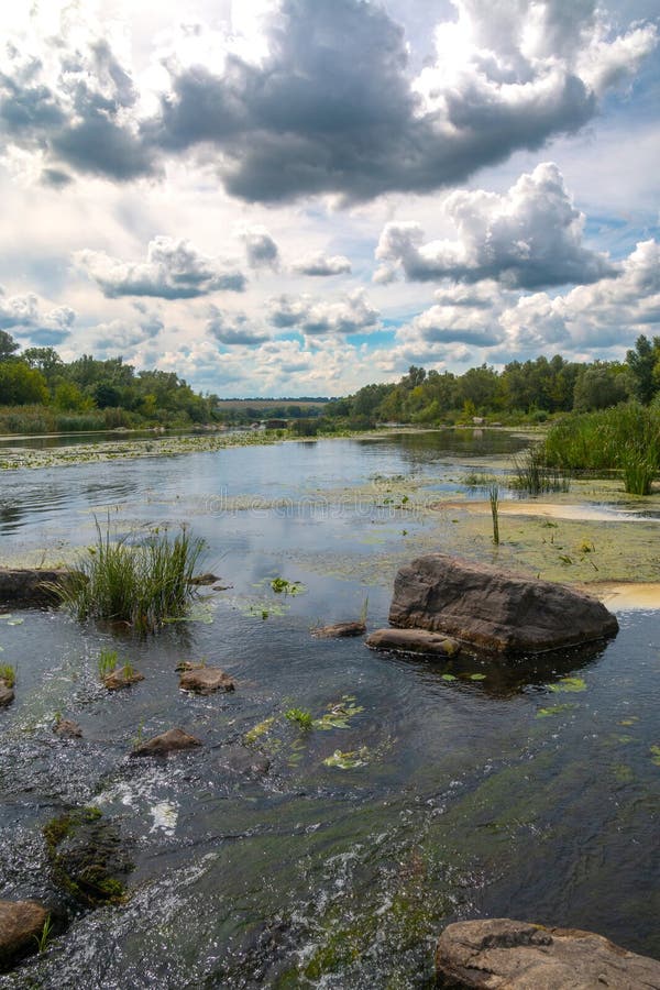 Clouds_above_the_surface_of_the_Southern_Bug_River_in_Ukraine Stock ...