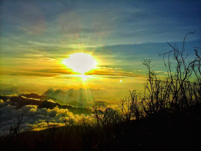 The Clouds Below III stock image. Image of clouds, arjuno - 128046321