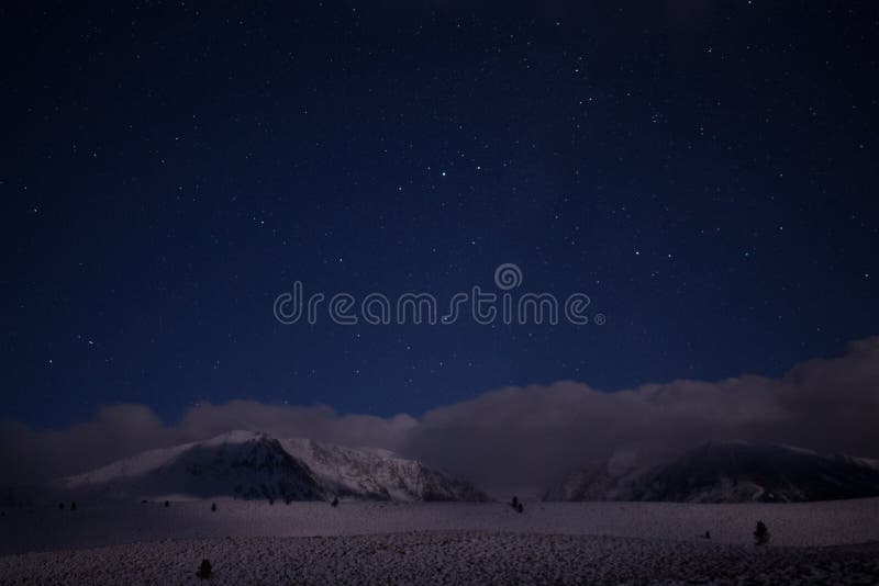 Clouds Blowing Over Mountain at Midnight Stock Image - Image of clouds ...