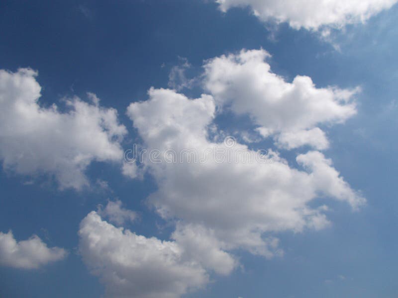 Clouds in the blue sky stock photo. Image of group, clouds - 97502472