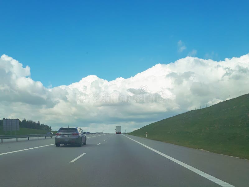Clouds on Blue Sky Over Asphalt Road Stock Image - Image of movement ...