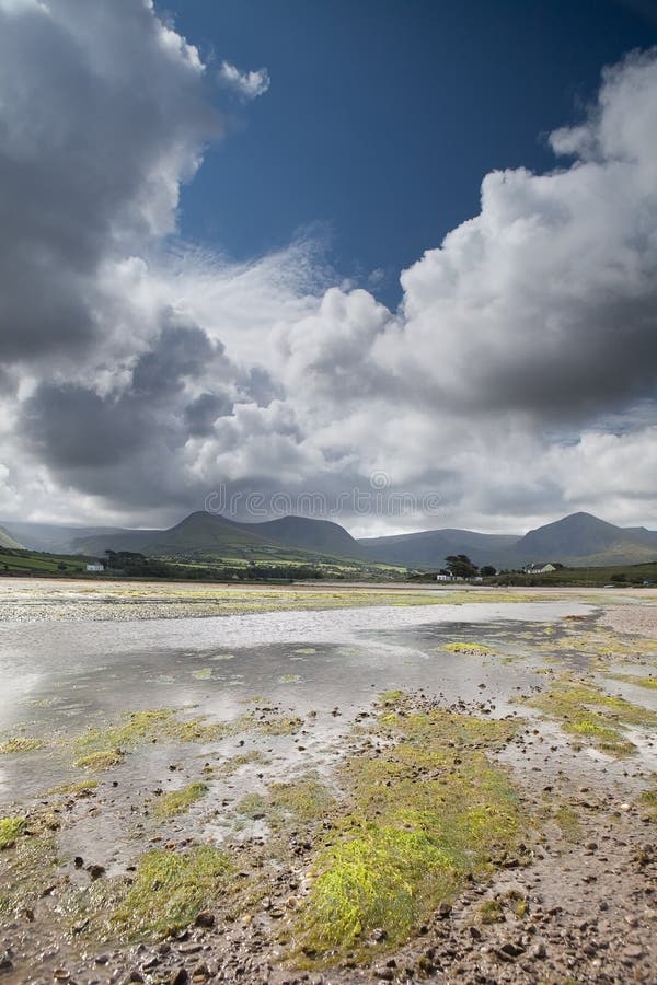 Clouds with Blue Sky Over Irish Hills and Estuary Stock Image - Image ...
