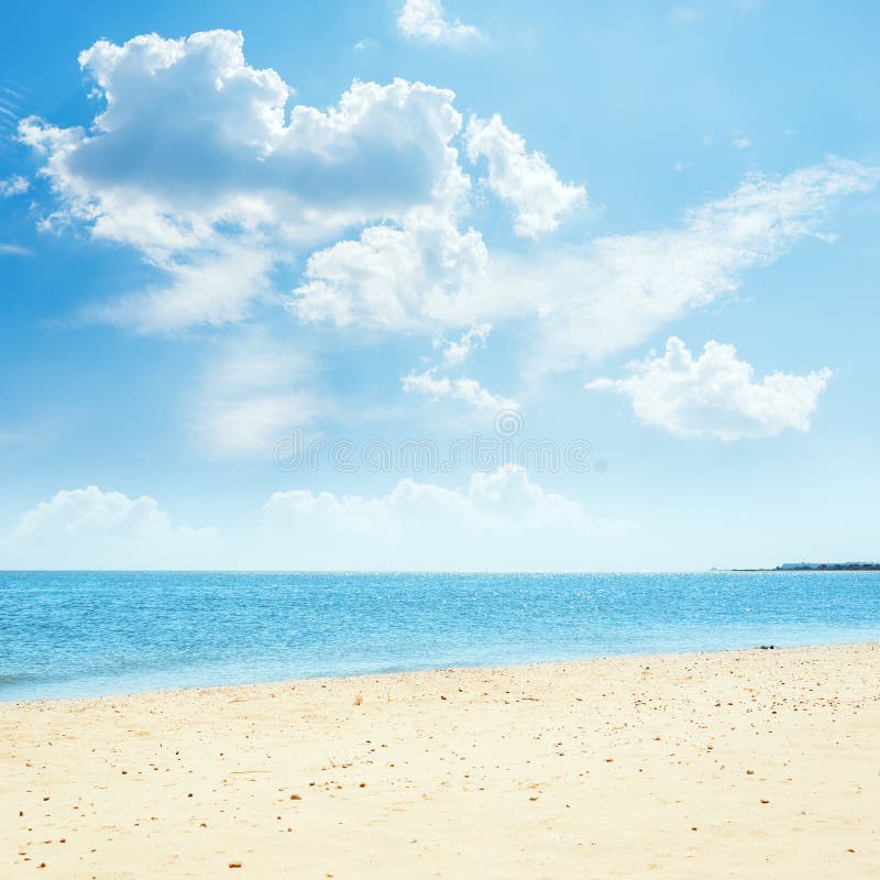 Low Clouds in Blue Sky Over Sea and Sand Stock Photo - Image of horizon ... Low Clouds in Blue Sky Over Sea and Sand Stock Photo - Image of horizon ...