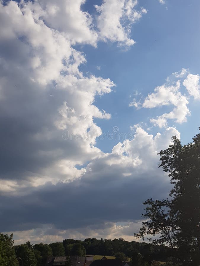 Clouds and blue sky stock photo. Image of rain, blue - 128321188