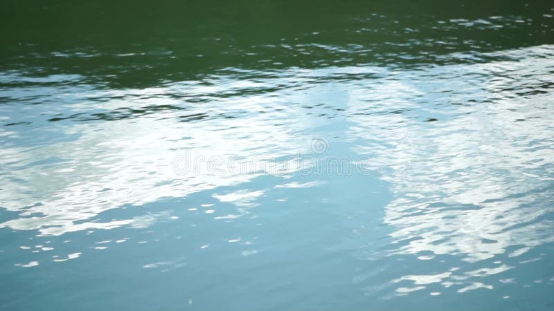 Clouds in Blue Sky Reflect on Lake, Movement of Wave on Water Surface ...